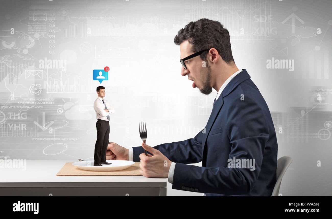 Giant businessman eating small man with financial background Stock ...