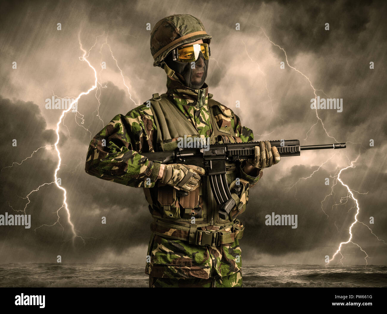 Armed soldier standing in rainy obscure weather Stock Photo - Alamy