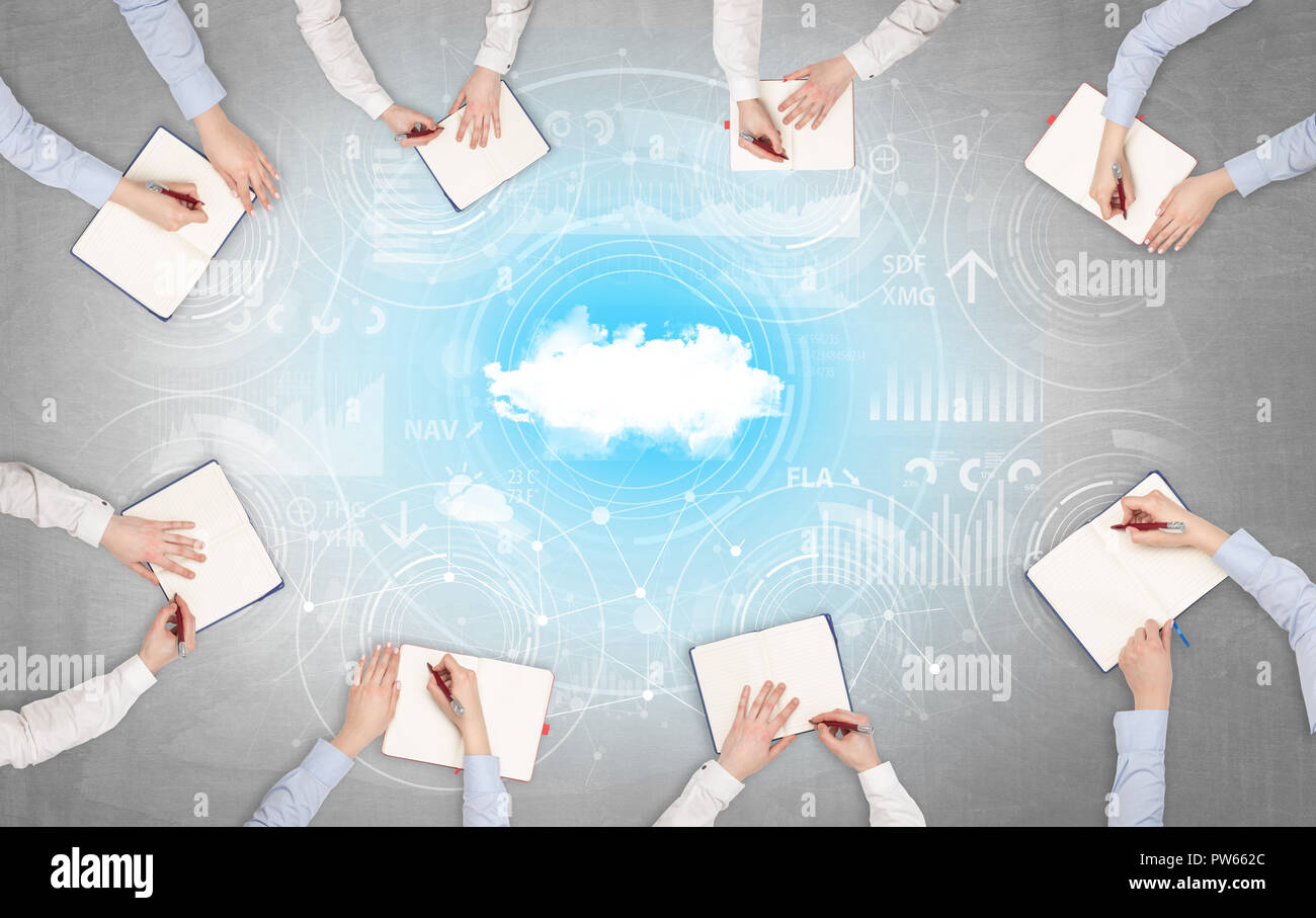 Group of people with devices in hands working on reports with online ...