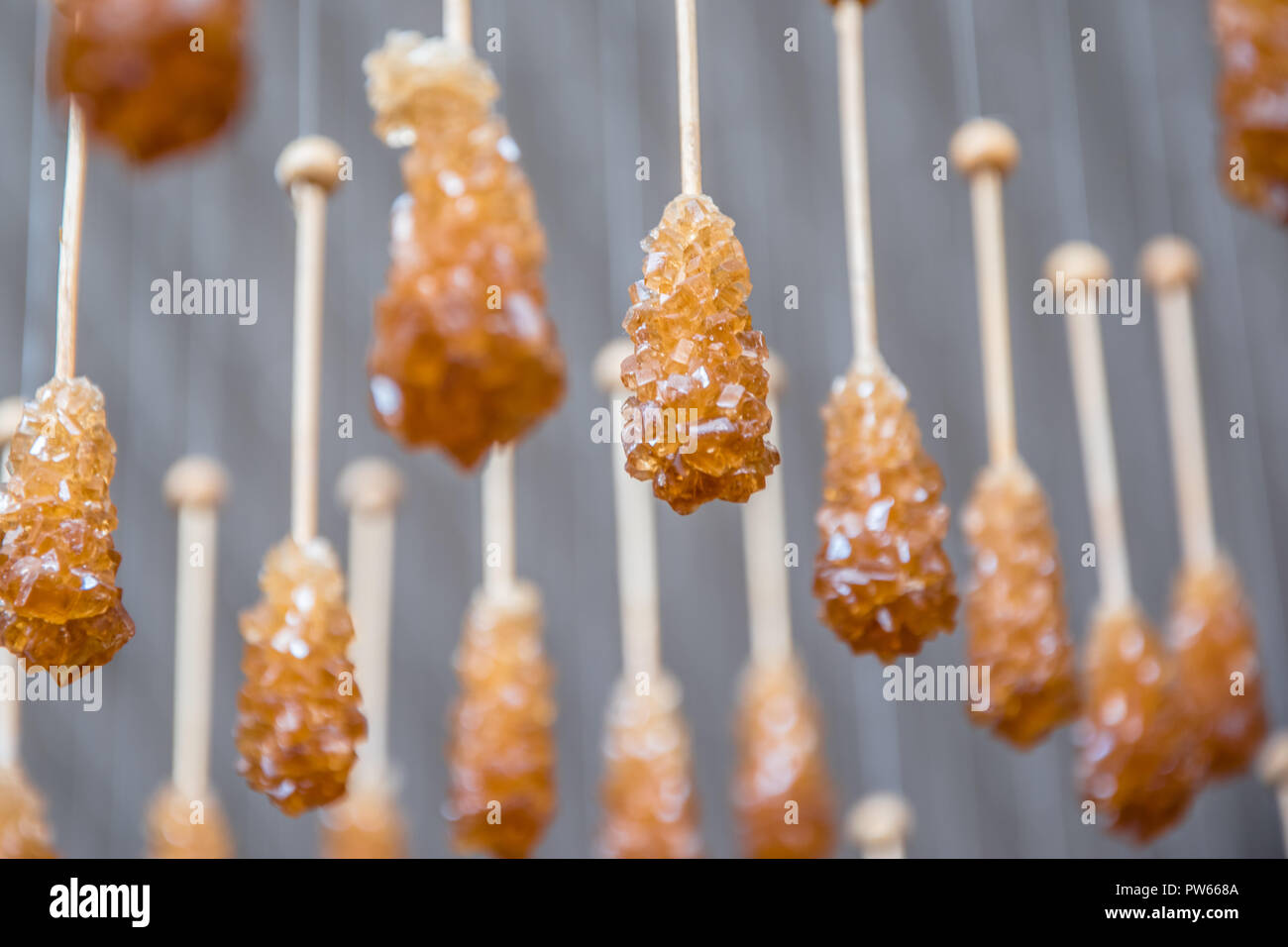 Candy Sticks Hanging from the Room Ceiling Stock Photo - Alamy