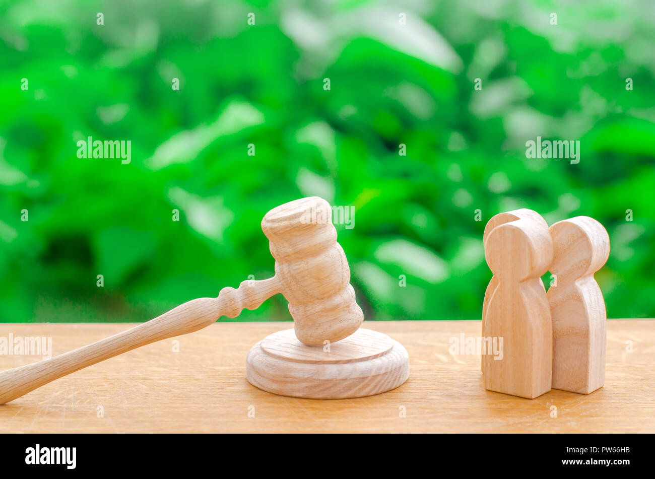 Three men and a hammer of the judge. The trial of cases in court, the ...