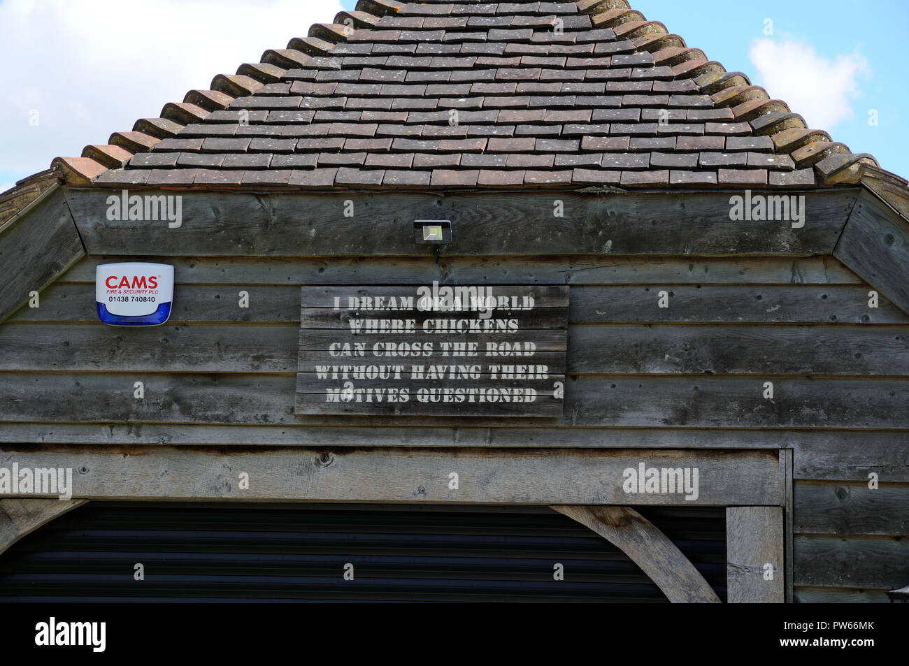 Curious sign on building, Pirton, Hertfordshire Stock Photo - Alamy