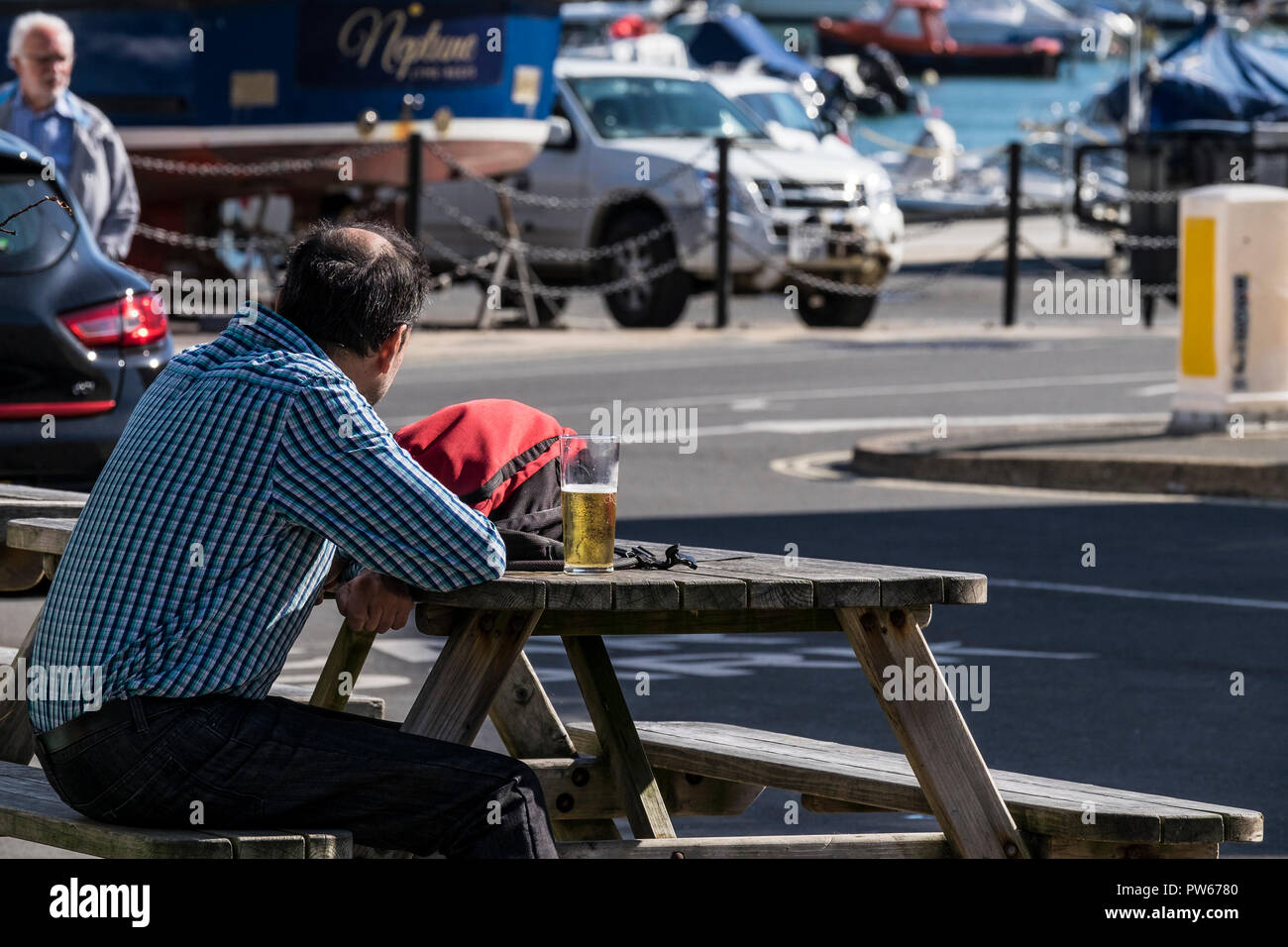 Sitting at a pub table hi-res stock photography and images - Alamy