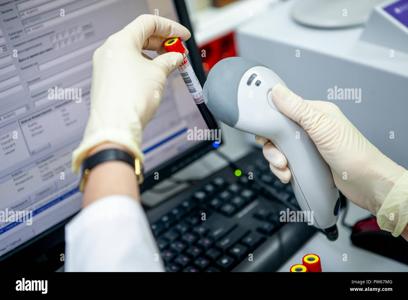 Scientist medical researcher enters data hi-res stock photography and ...