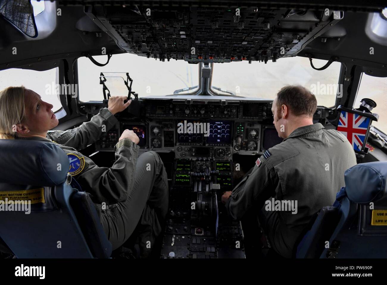 Maj. Kari Flemming, left, 14th Airlift Squadron pilot, and Flight Lt ...