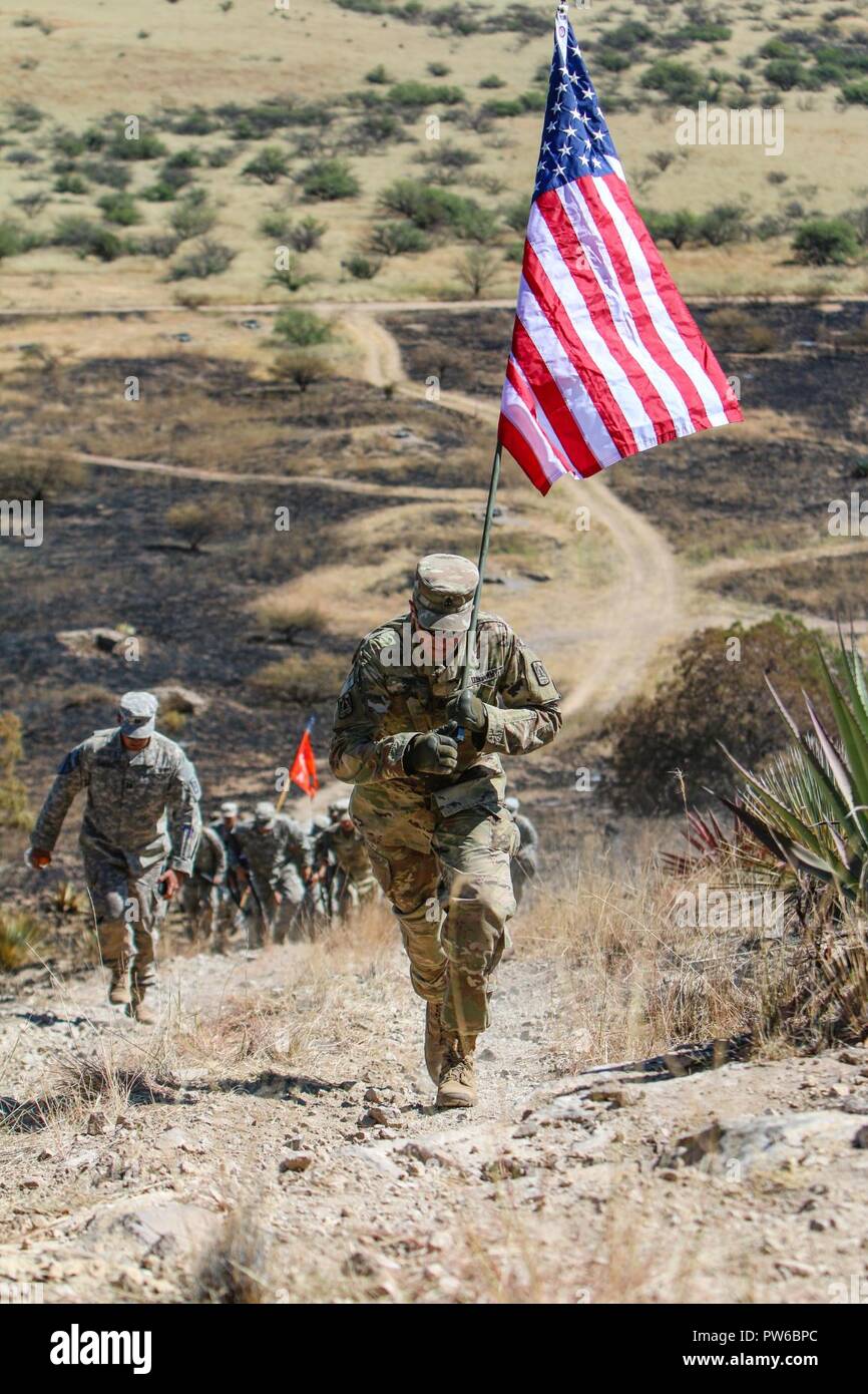 Alpha Company, 40th Expeditionary Signal Battalion conducts a live fire ...