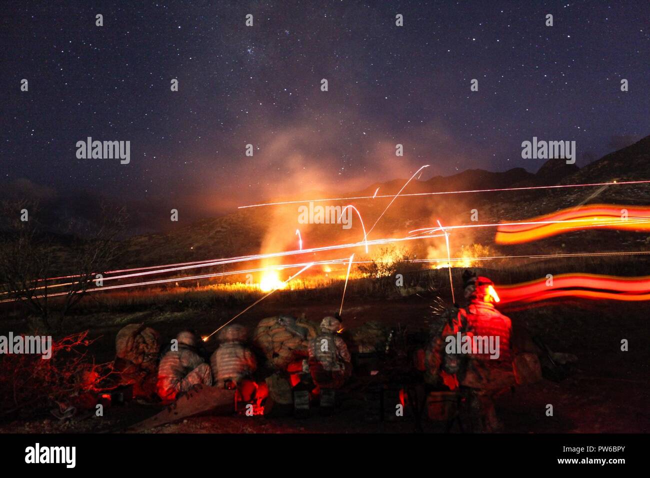 Alpha Company, 40th Expeditionary Signal Battalion conducts a live fire ...