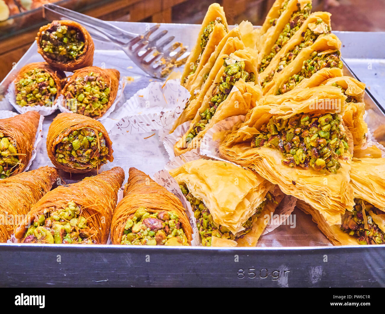 Baklava, a traditional Arab dessert made with layers of Filo, a very ...