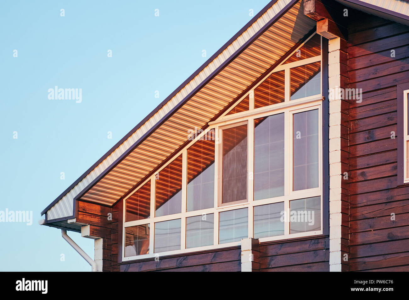 Part of facade of modern house with glazed veranda Stock Photo - Alamy