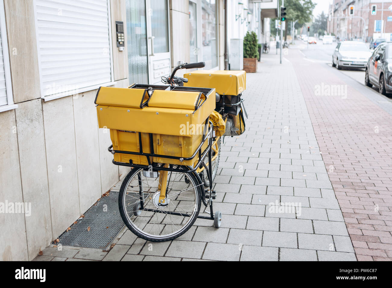 Postman bike hi-res stock photography and images - Alamy