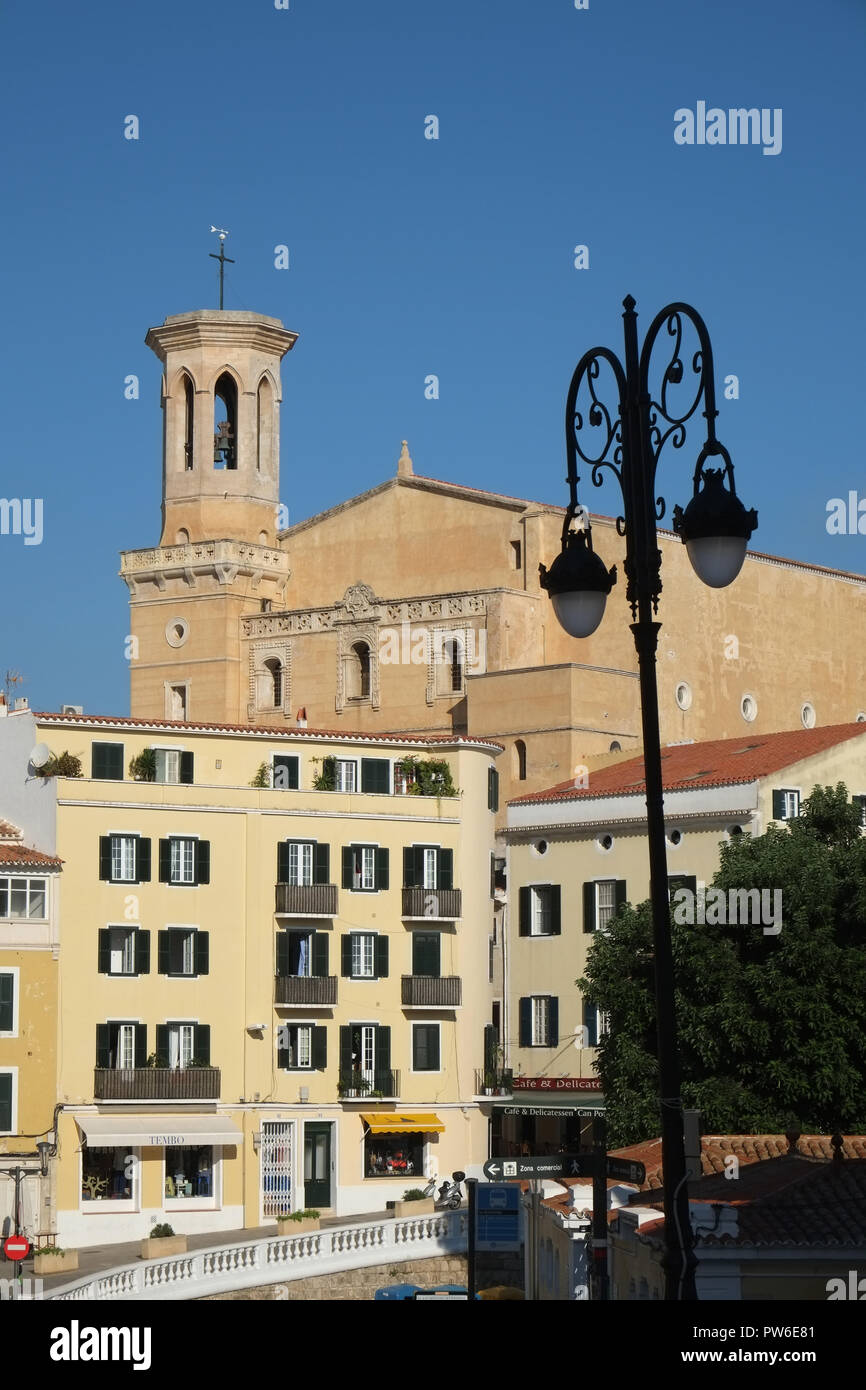 Iglesia de Santa Maria towers above apartments in the centre of Mahon ...