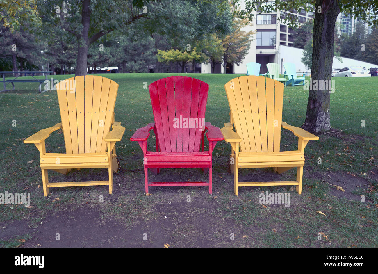 Wooden chairs in a park Stock Photo - Alamy