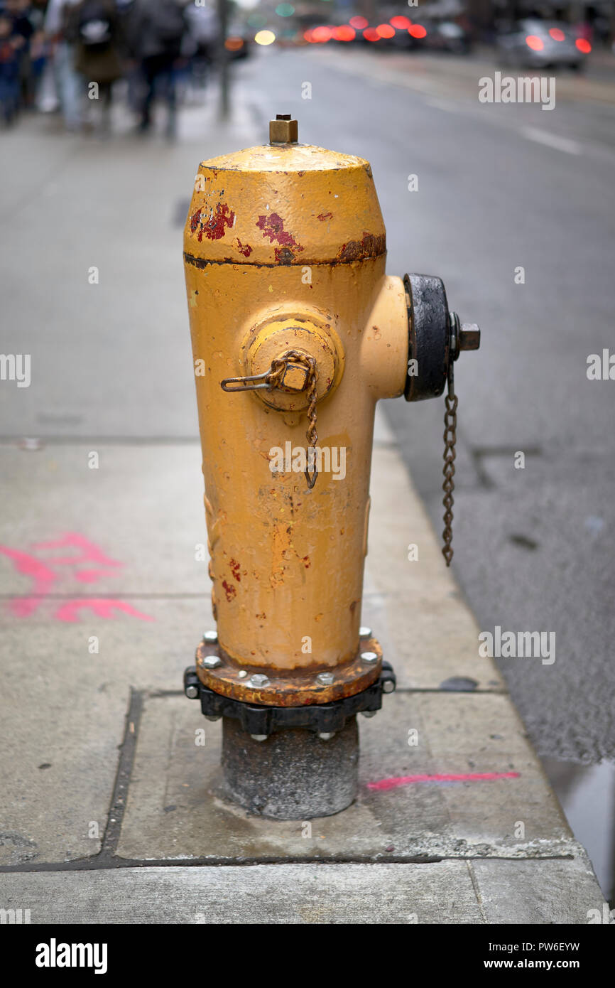 yellow fire hydrant Stock Photo - Alamy
