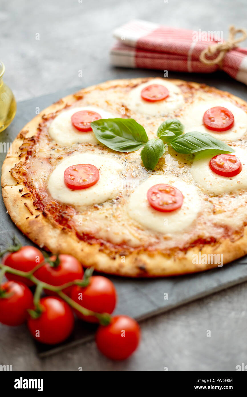 Homemade pizza with tomatoes, mozzarella Stock Photo - Alamy