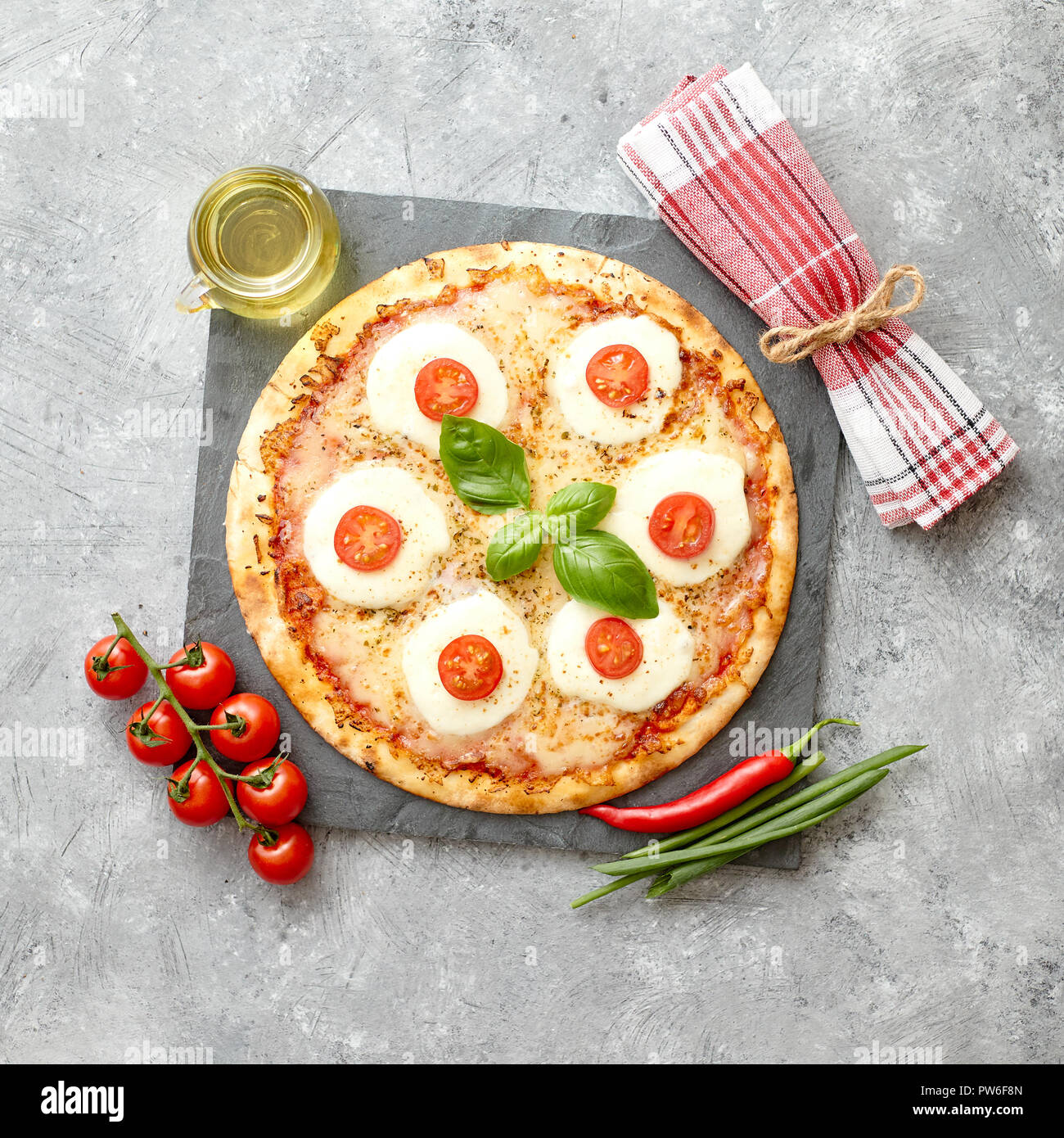 Homemade pizza with tomatoes, mozzarella Stock Photo - Alamy