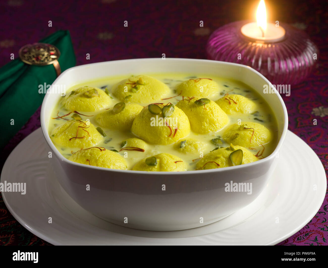 RASMALAI, AN INDIAN DESSERT MADE FROM COTTAGE CHEESE SOAKED IN SWEET ...
