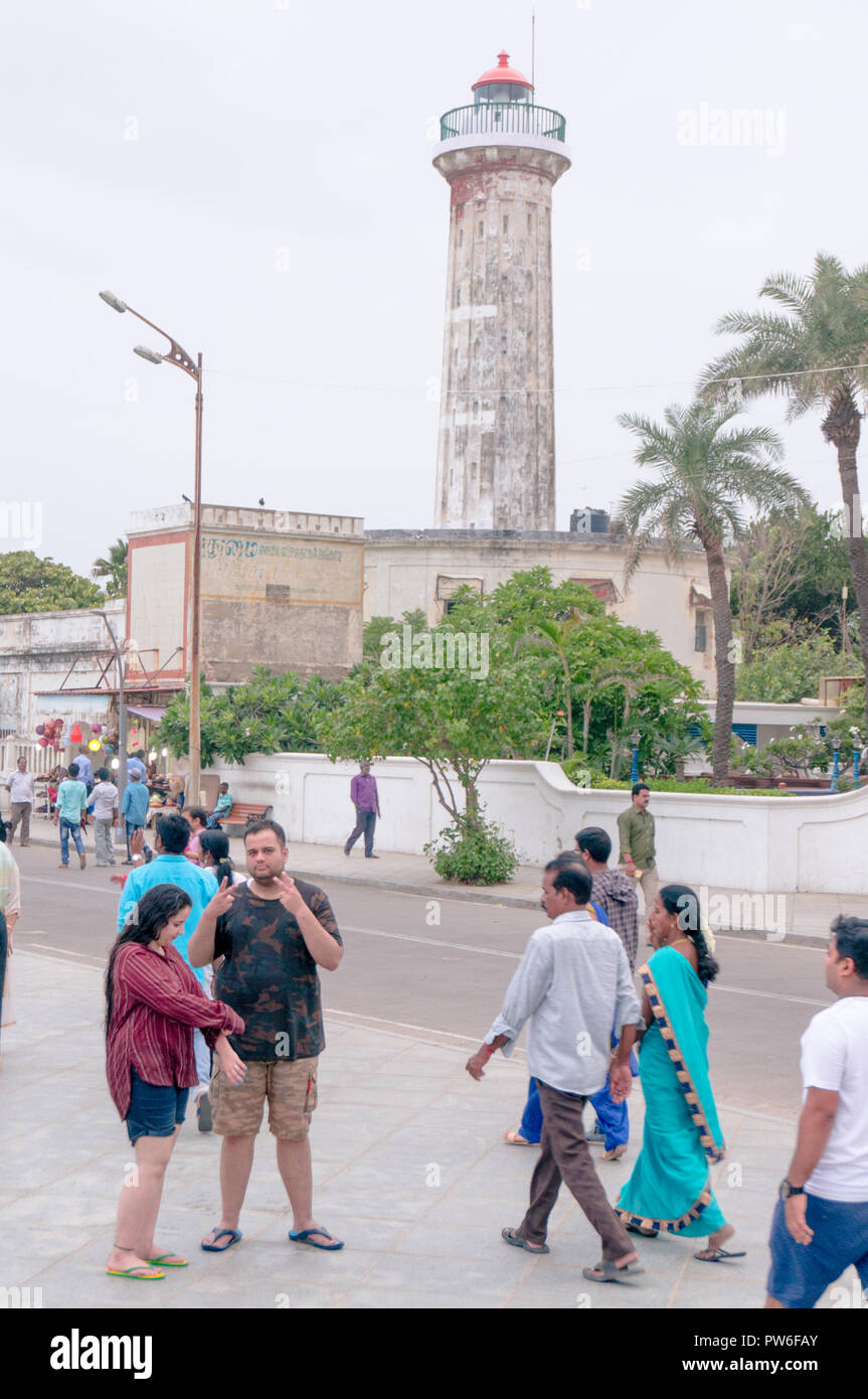 People walking in front of a lighthouse in pondicherry Stock Photo - Alamy