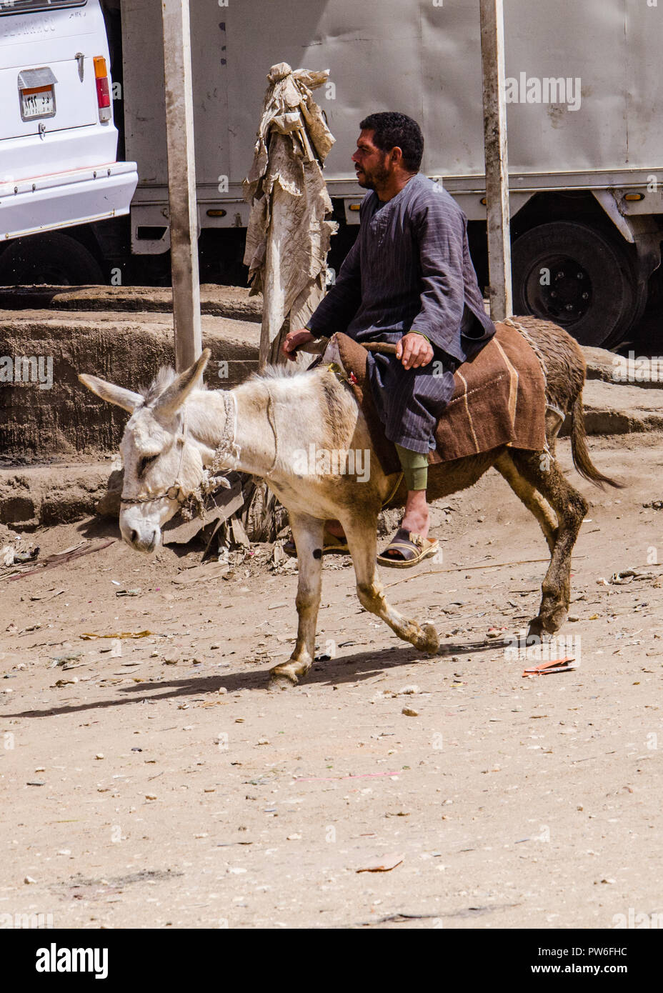 Saqqara, Unesco World Heritage, Cairo, Egypt - April 2018. Egyptian man ...