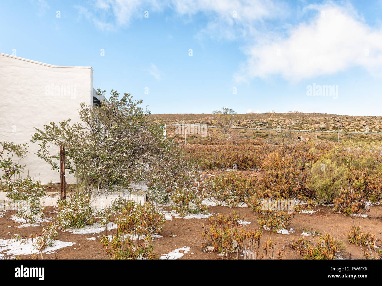 SUTHERLAND, SOUTH AFRICA, AUGUST 7, 2018: Snow is visible at the ...