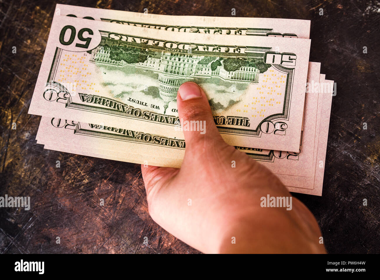 Hand Holding 50 Usd High Resolution Stock Photography and Images - Alamy