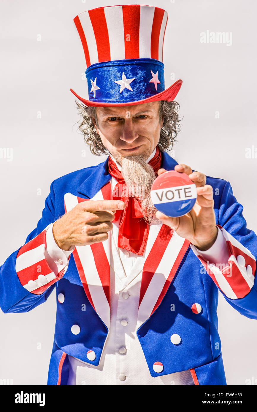Uncle Sam holding a vote pin and pointing at it telling you to vote ...