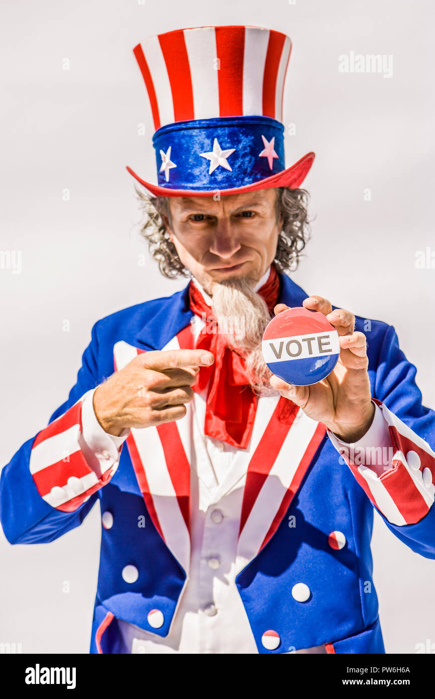 Uncle Sam holding a vote pin and pointing at it telling you to vote ...