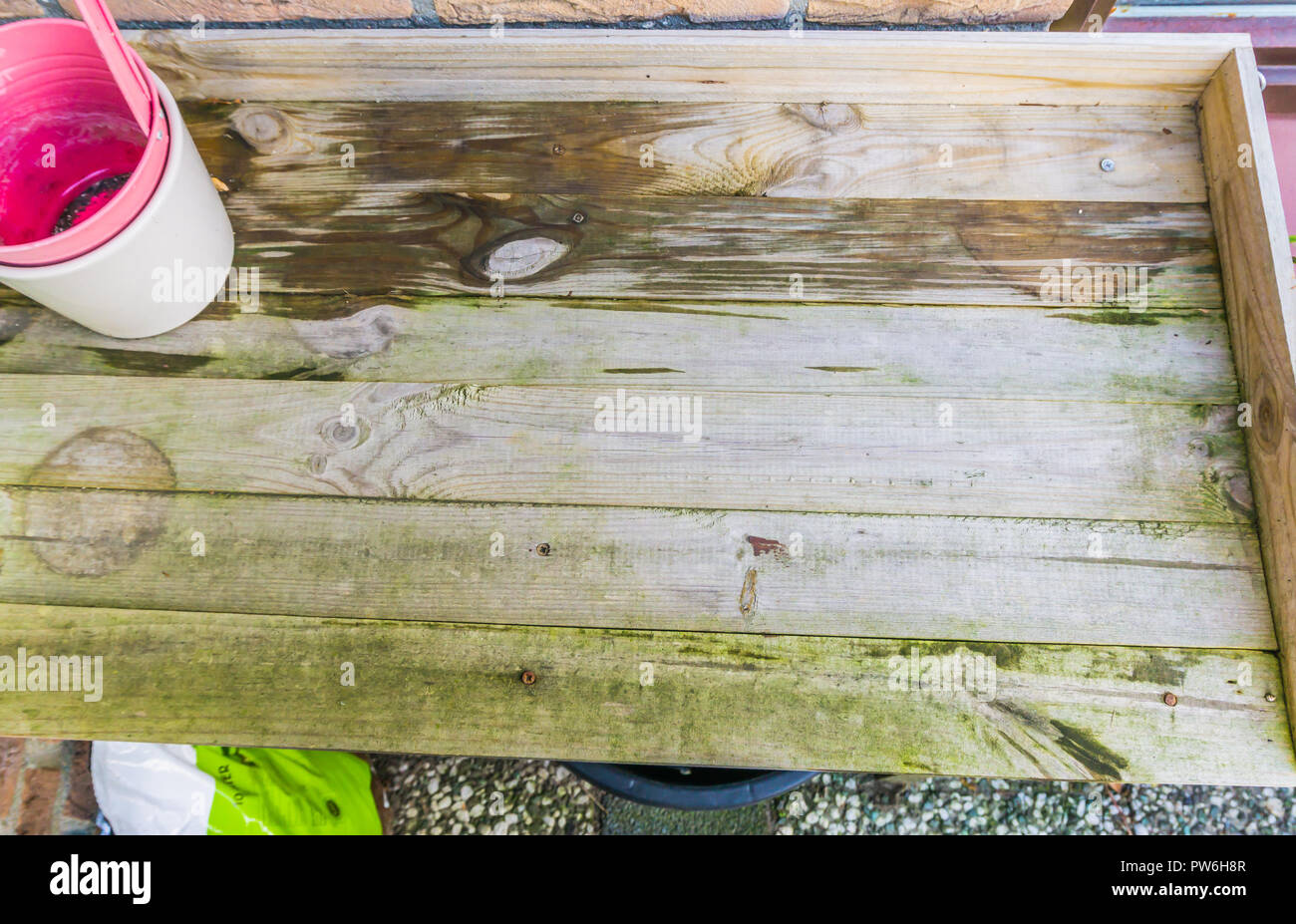 empty wooden garden table hand crafted out of some wood planks Stock ...