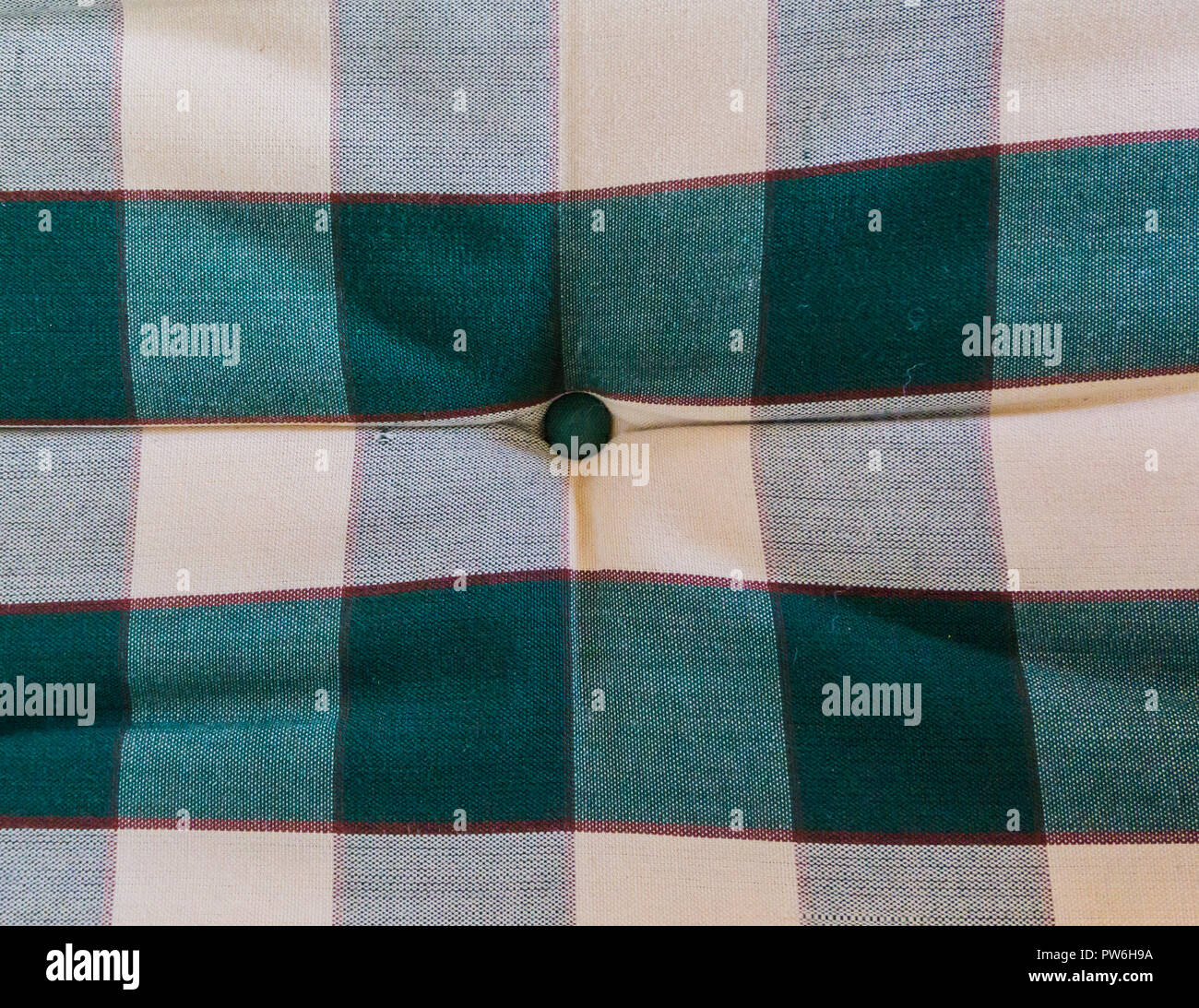 square blocks pattern on a pillow closeup macro texture background ...