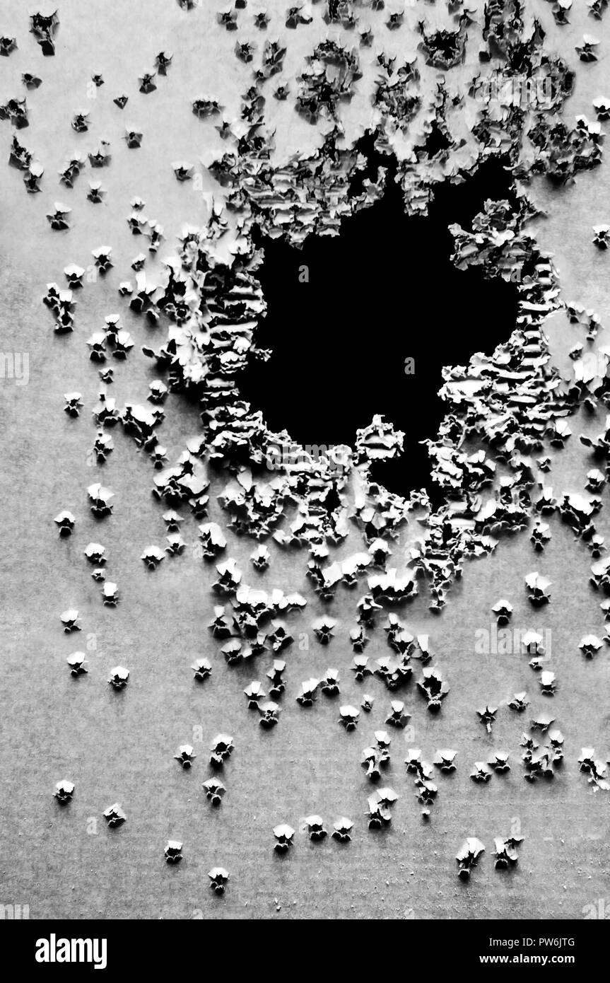 Sniper bullet holes Black and White Stock Photos & Images - Alamy