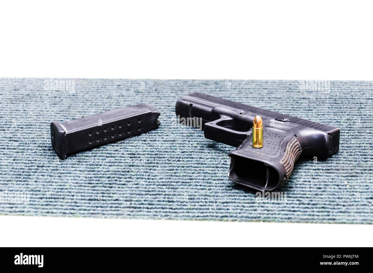 On this image you can see the handgun pistol, empty magazine, one ...