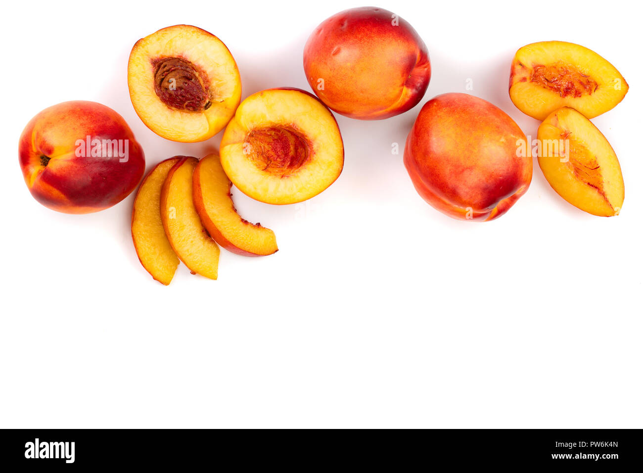 ripe nectarine with leaves isolated on white background with copy space ...