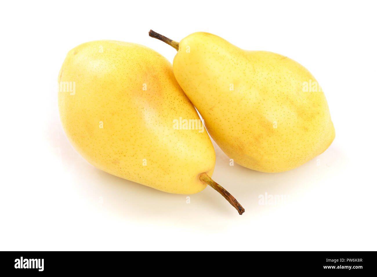 two ripe yellow pear fruits isolated on white background Stock Photo ...