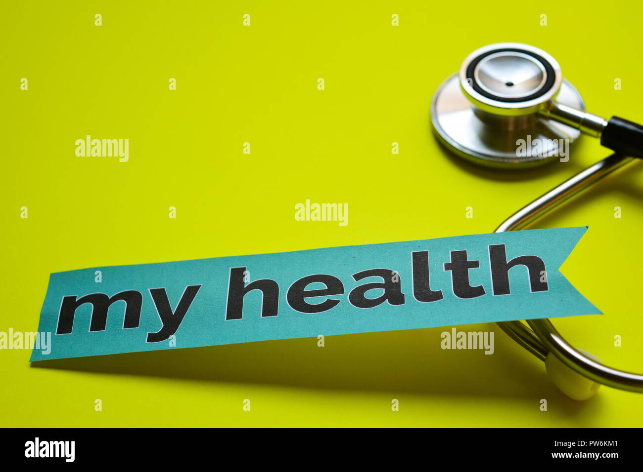My health with stethoscope concept inspiration on yellow background ...