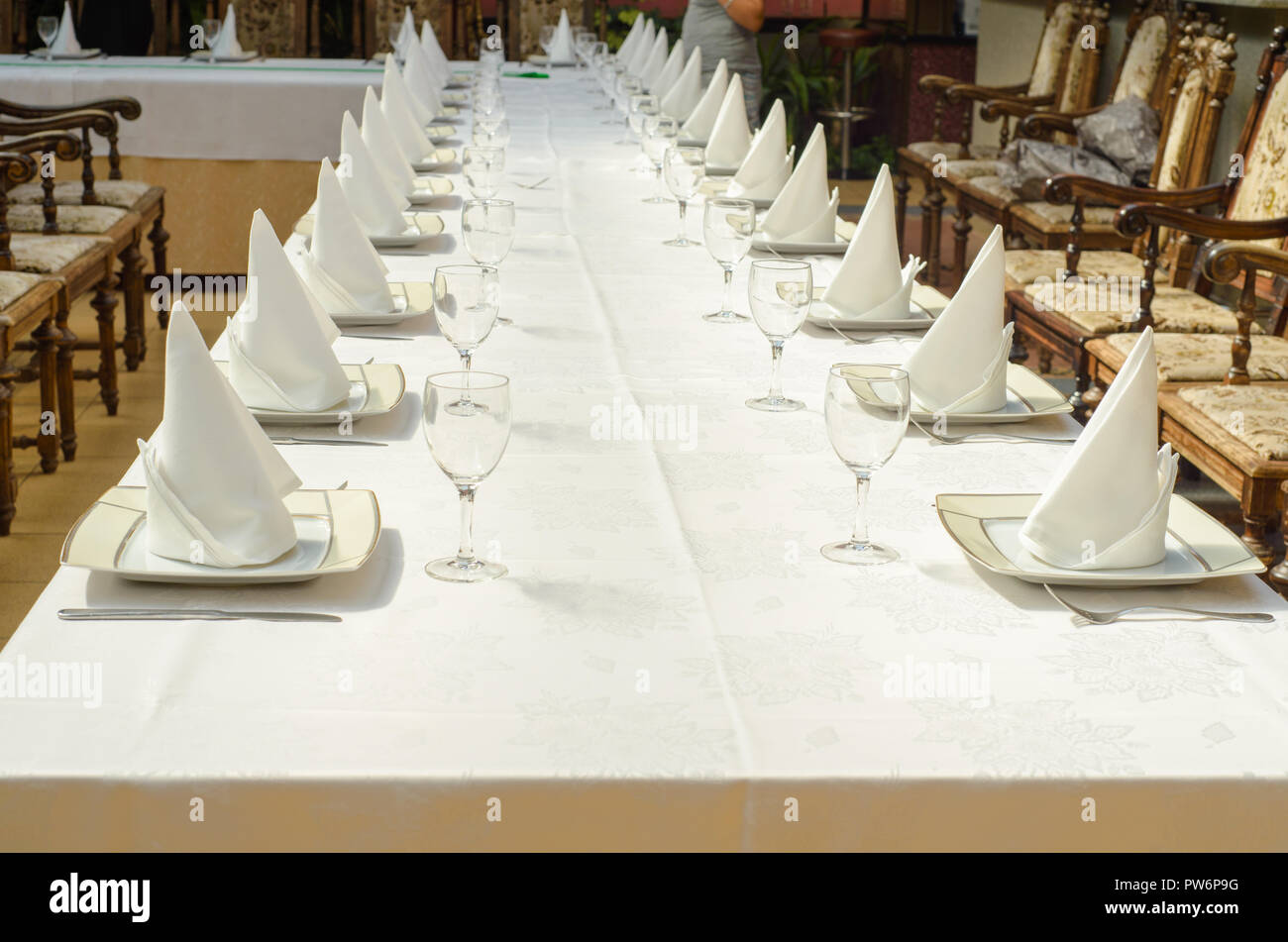 Long served table Stock Photo - Alamy