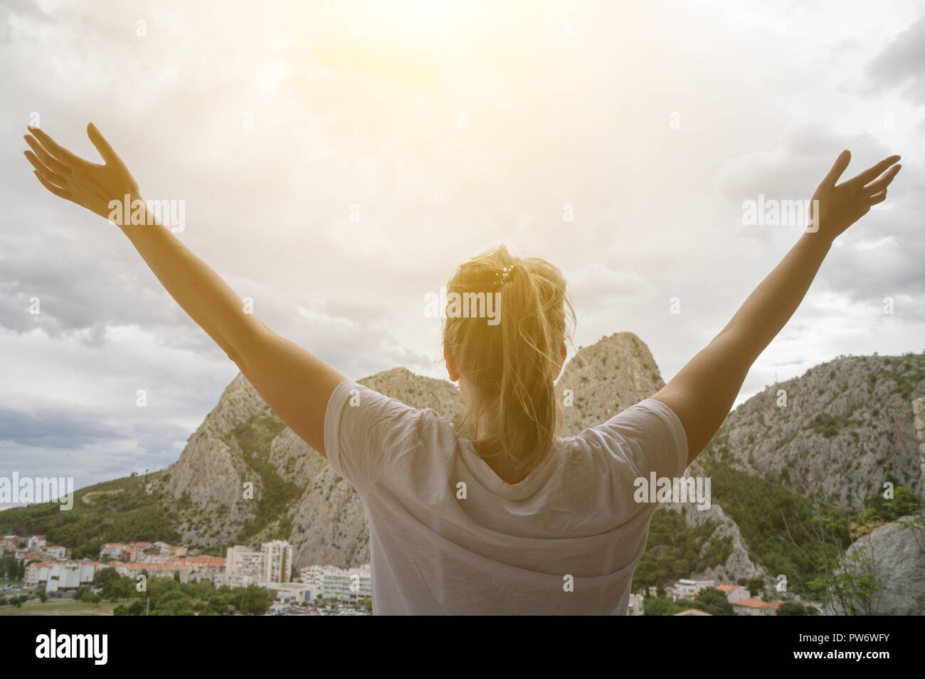 Woman arms wide sun hi-res stock photography and images - Alamy