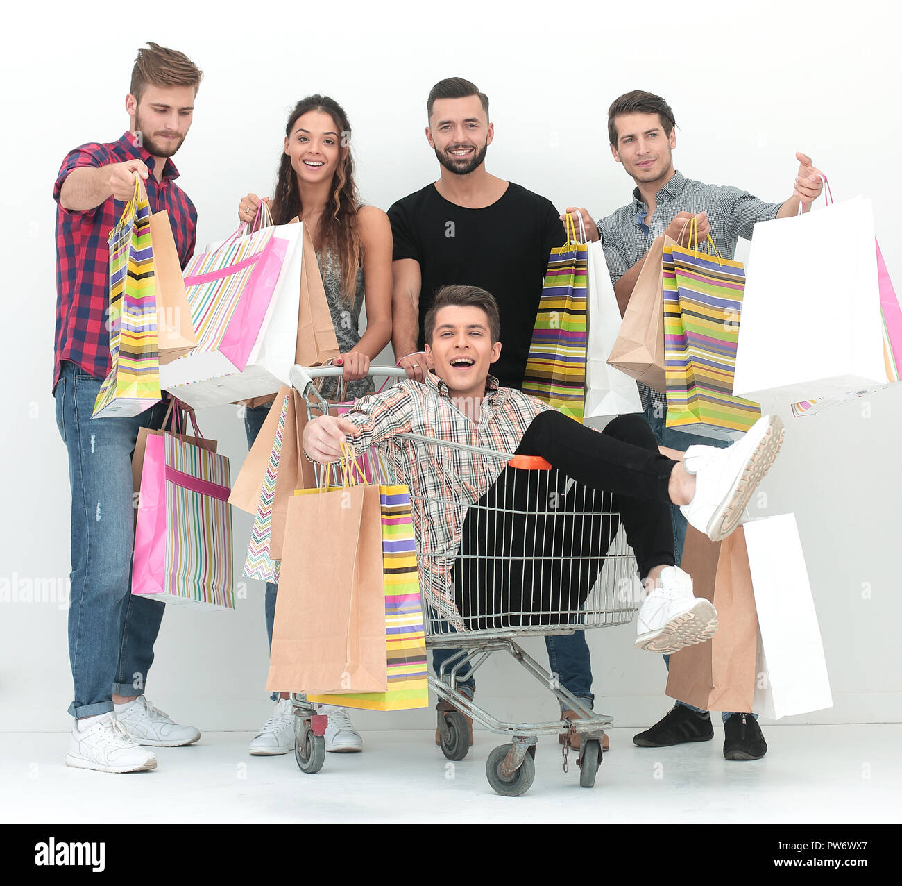happy group of young people with shopping bags Stock Photo - Alamy
