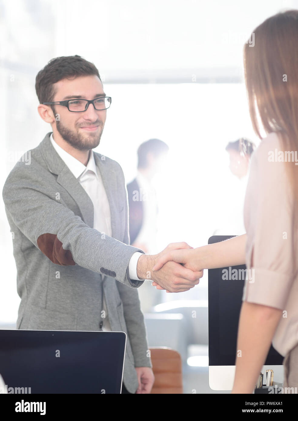 welcome handshake financial partners Stock Photo - Alamy