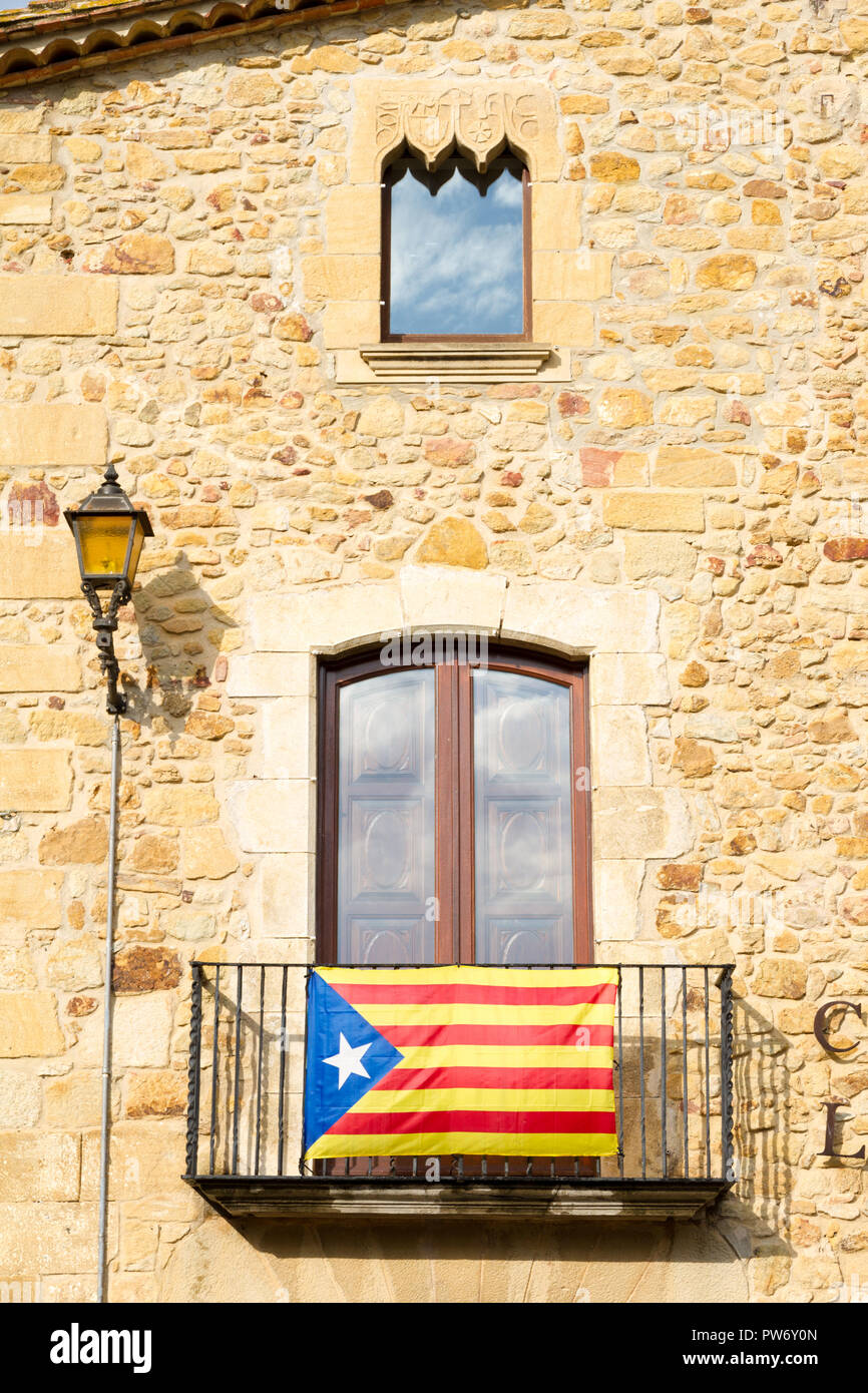 The Estelada (starred flag) symbolizing Catalan independence hanging ...