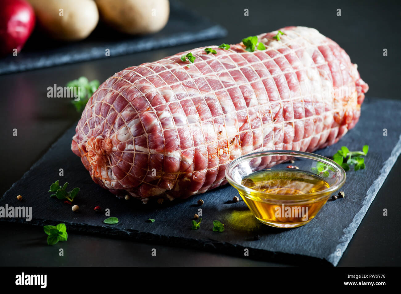 Raw butcher roast pork hi-res stock photography and images - Alamy