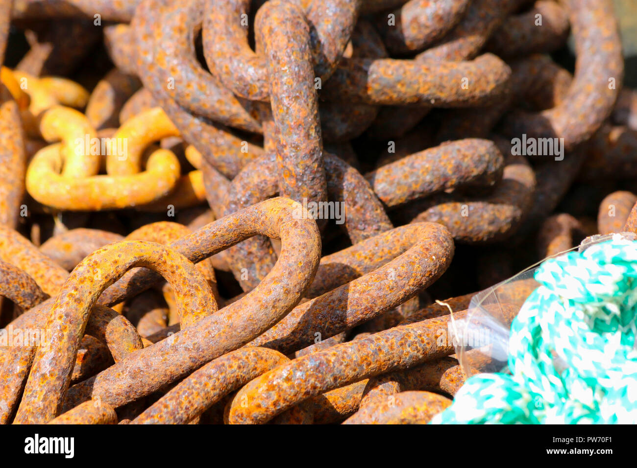 A pile of rusting chains used to weigh down fishing nets on the ...