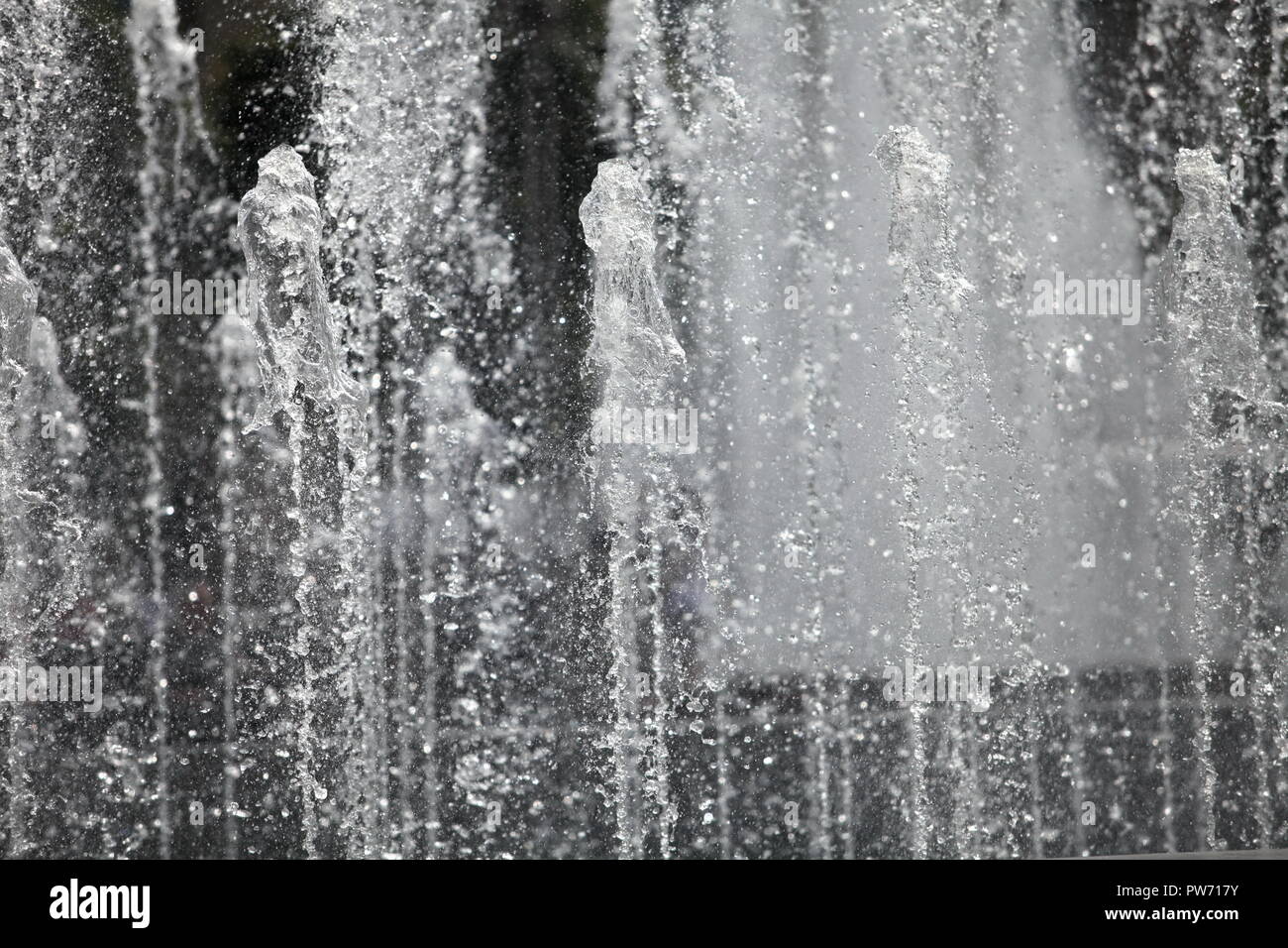 Water wall fountains from spouting vertical background, close-up Stock ...