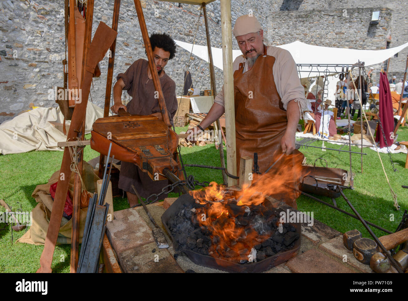 Bellinzona, Switzerland - 27 May 2018: Blacksmith who is forging a ...