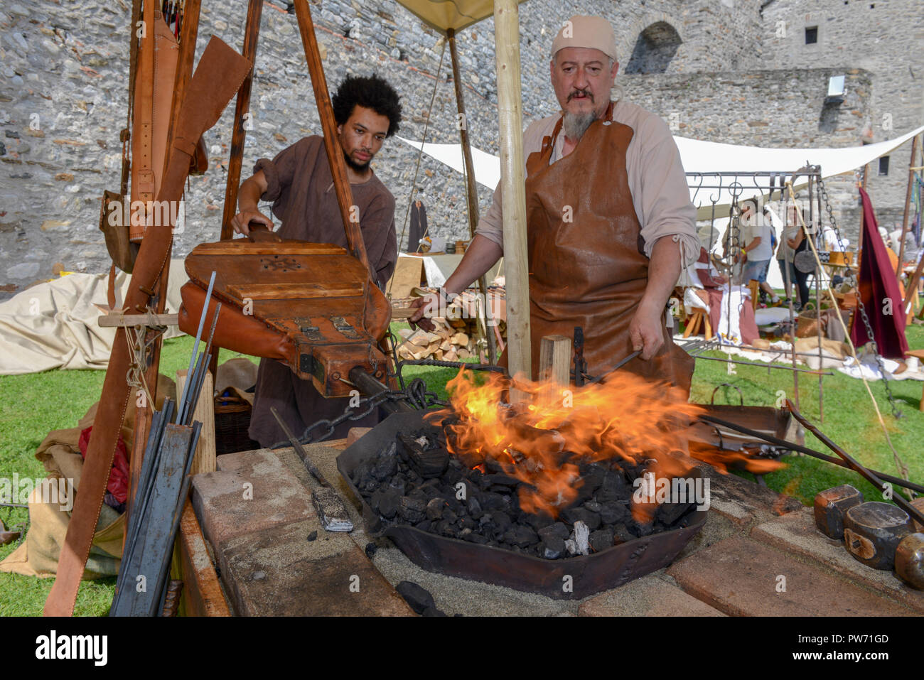 Bellinzona, Switzerland - 27 May 2018: Blacksmith who is forging a ...