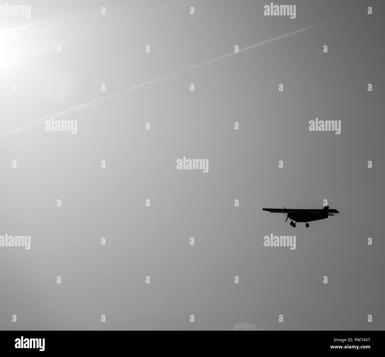 Small aircraft in sky Black and White Stock Photos & Images - Alamy
