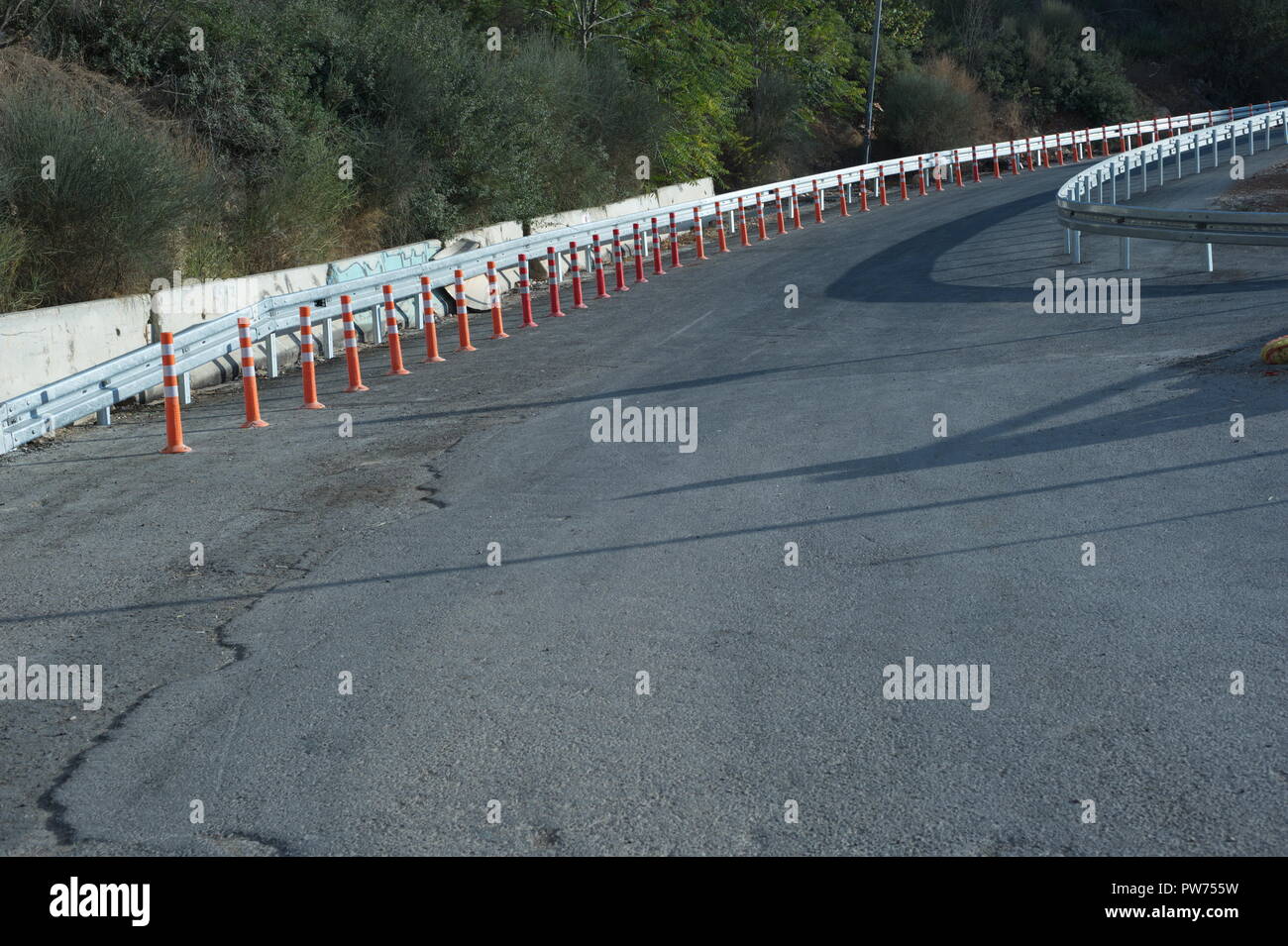 a curve in road Stock Photo - Alamy