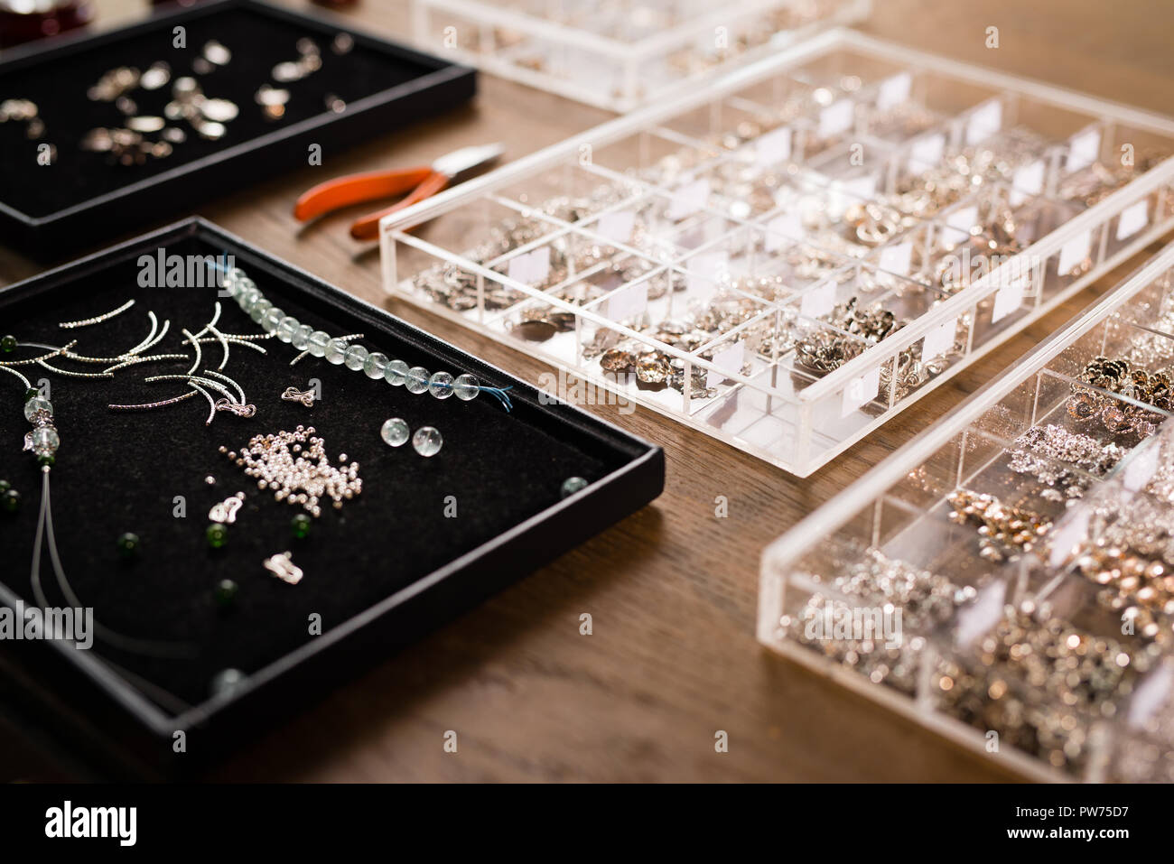 Tools for jewelry making, colorful stone beads. Jewellry workplace ...