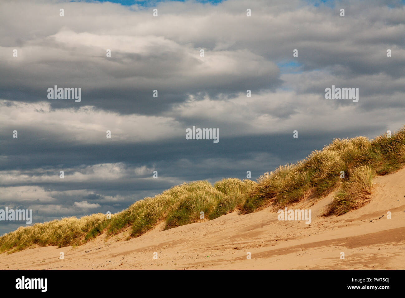 Sand dune at Talacre beach on the North Wales coast with clouds Stock ...