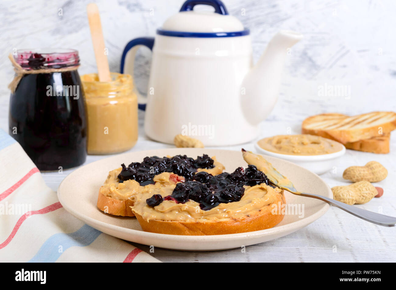 Toast with butter tea and red jam hi-res stock photography and images ...