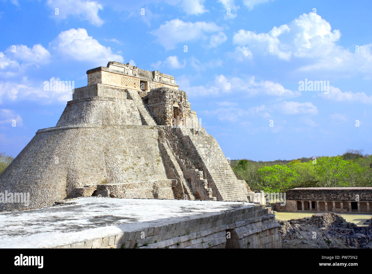 Ancient Mayan pyramid of the Magician in Uxmal with god Chaac masks ...