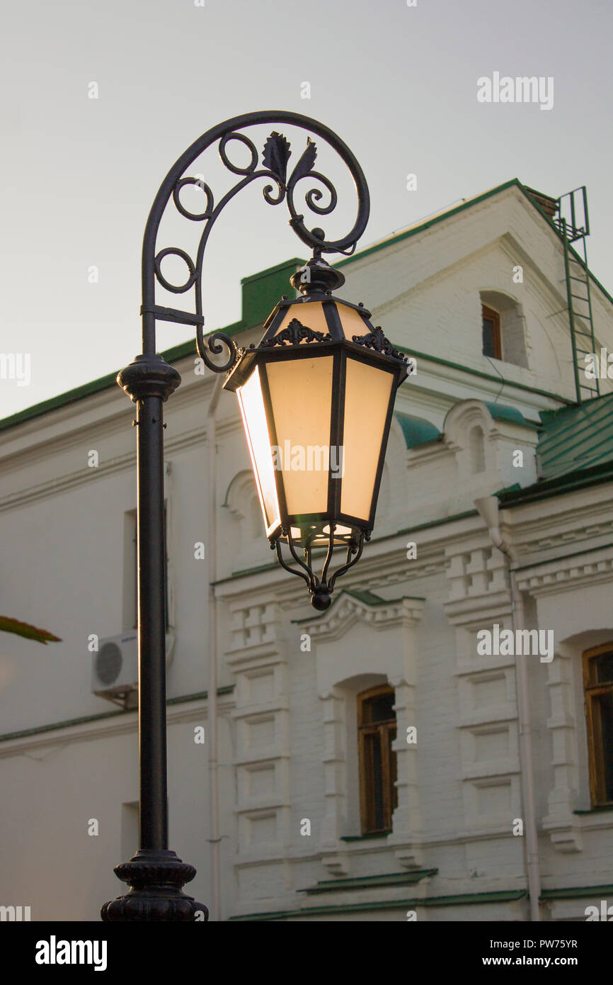 Street lamp with light hi-res stock photography and images - Alamy